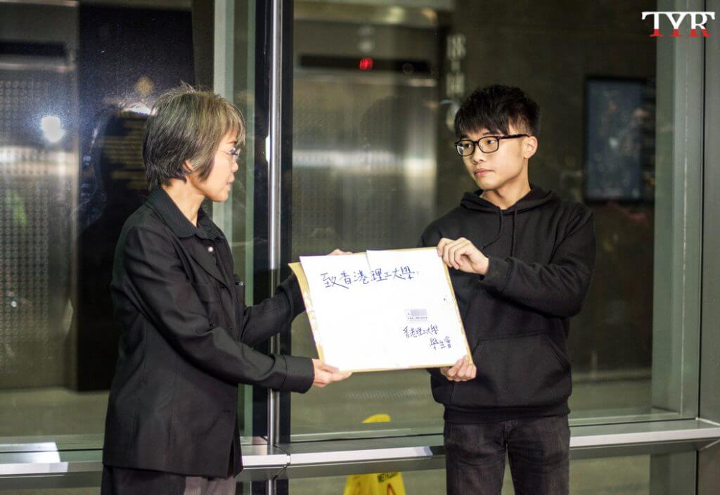 Hundreds protest on PolyU campus against disciplinary action on ...